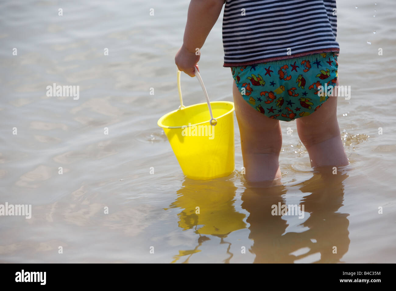 Collecting stone child hi-res stock photography and images - Alamy