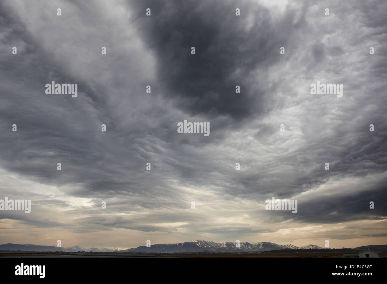 Overcast Sky with Mountains, Eastern Iceland Stock Photo - Alamy