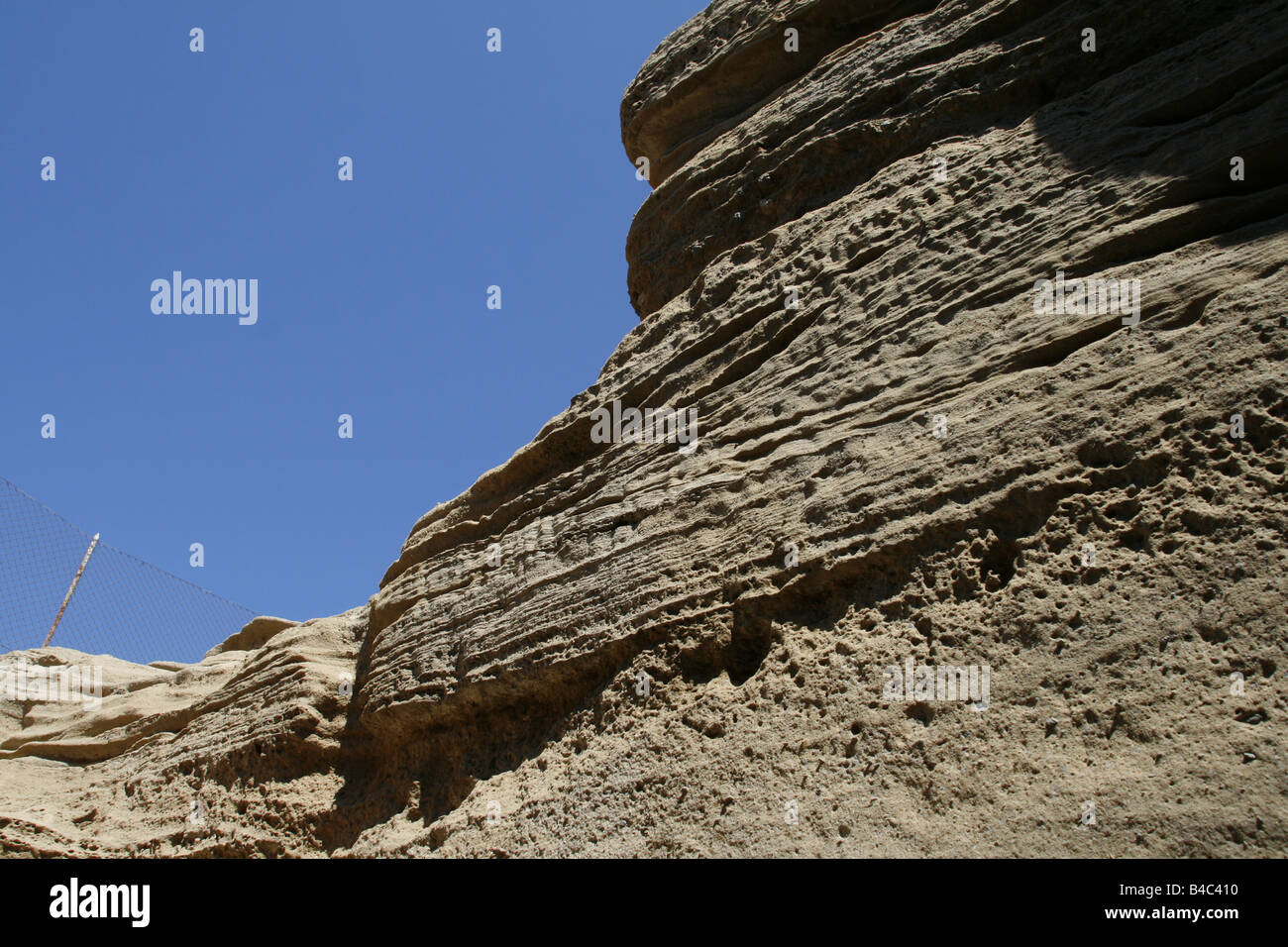 pattern on eroded volcanic rock formation on coast at venotene, italy ...