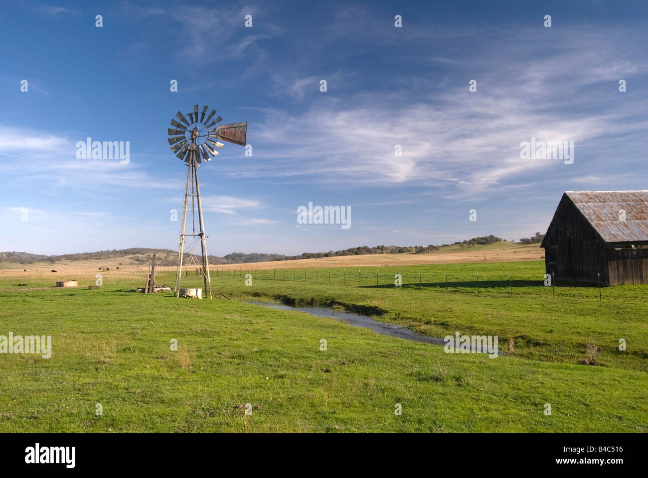 California Farm Wind Pump Stock Photo - Alamy