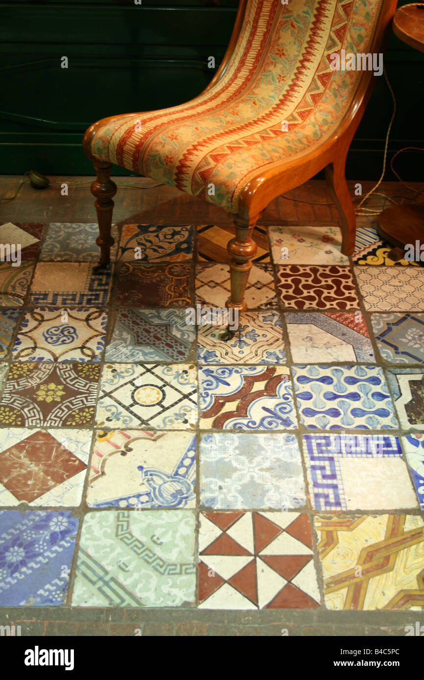 one antique type chair inside shop window display at night Stock Photo ...