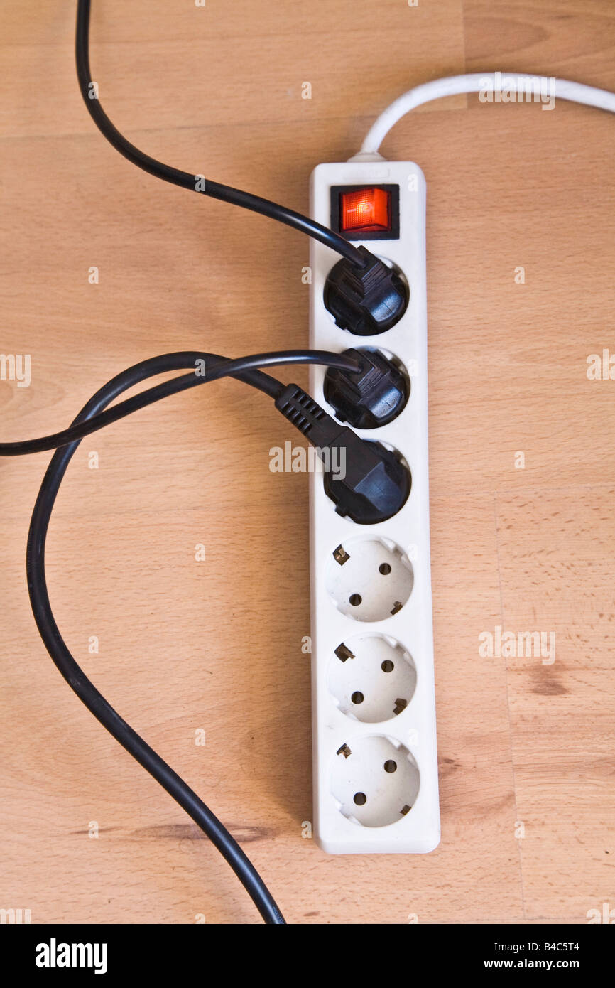 Six plug adaptor Stock Photo - Alamy