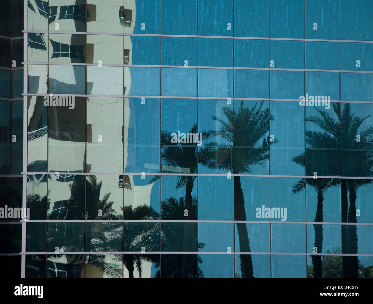Reflections on a building in Dubai Stock Photo - Alamy