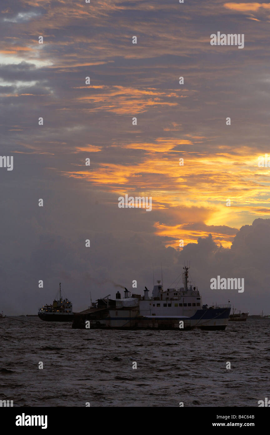 boat in sunset Stock Photo - Alamy