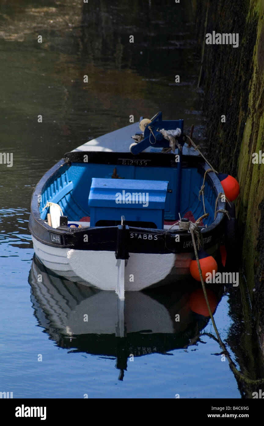 Small boat in St Abbs Harbour, in the Scottish Borders Stock Photo - Alamy