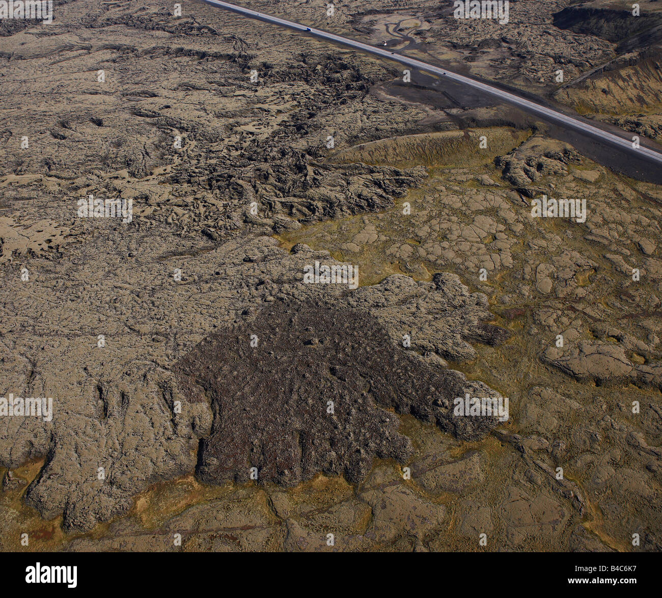 Aerial View of Road and Moss-Covered Lava Field, Iceland Stock Photo ...