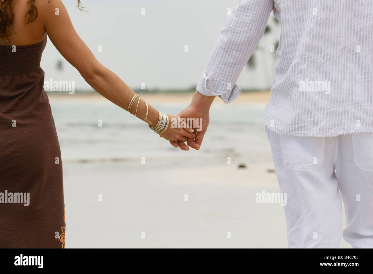 couple in love posing for their engagement photos at Dreams resort in ...