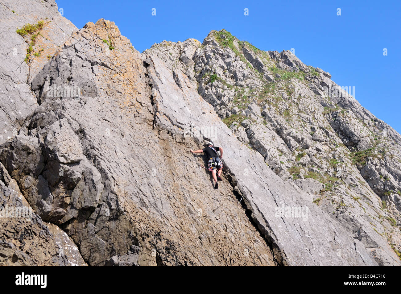 Climber at Three Cliffs Bay Gower Peninsular Glamorgan Wales Stock ...