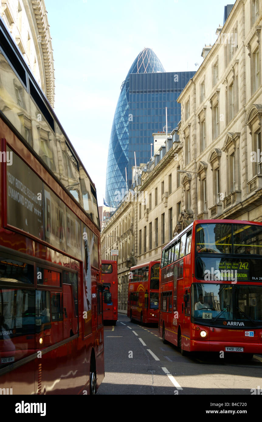 London Red Buses in the City of London Stock Photo - Alamy