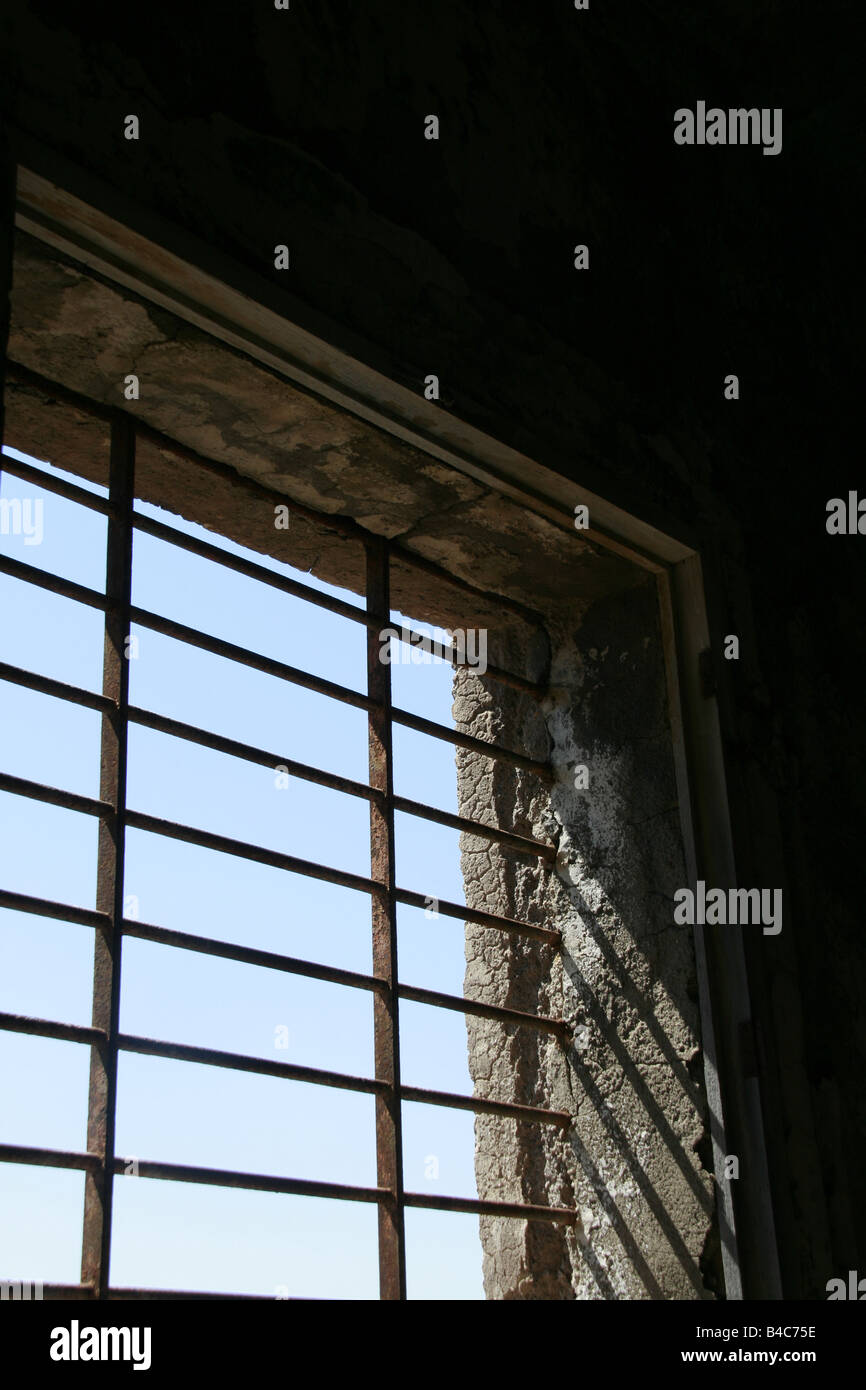 one high dark prison cell window with metal bars Stock Photo - Alamy