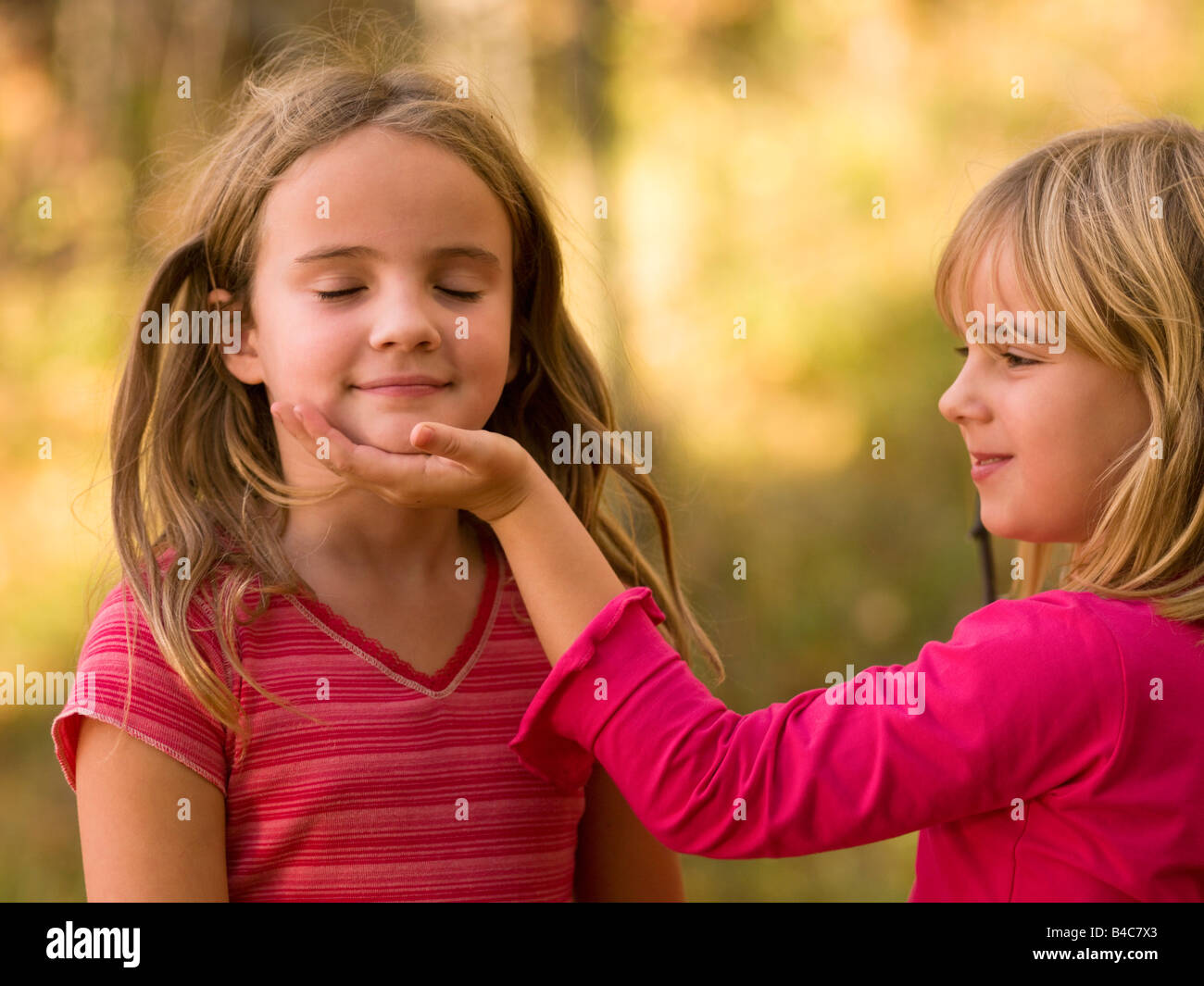 Two girls playing Stock Photo - Alamy Two girls playing Stock Photo - Alamy