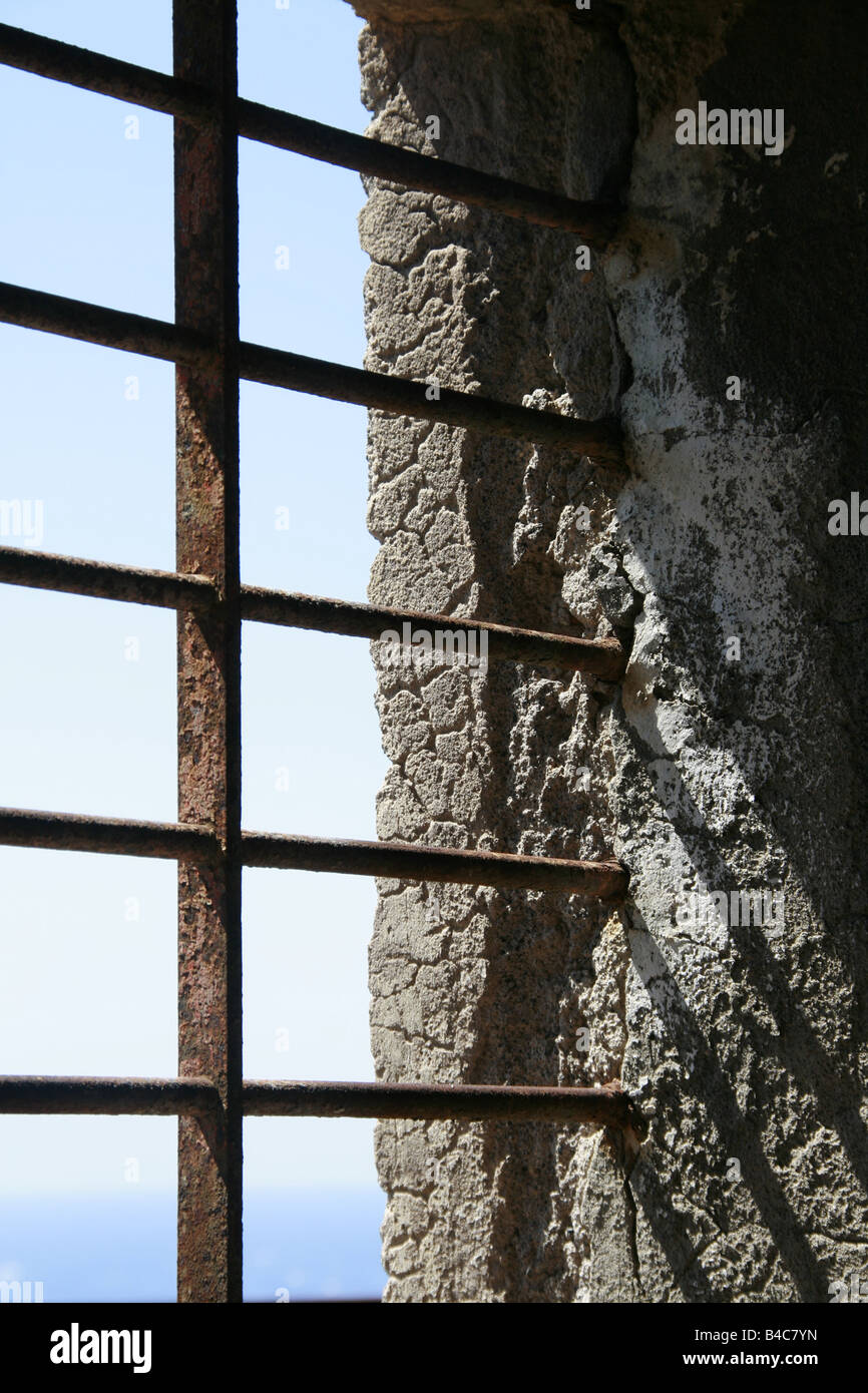 one high dark prison cell window with metal bars Stock Photo - Alamy