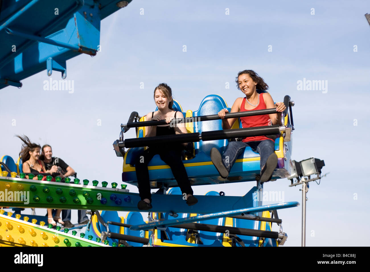 Girls on funfair ride on hi-res stock photography and images - Alamy