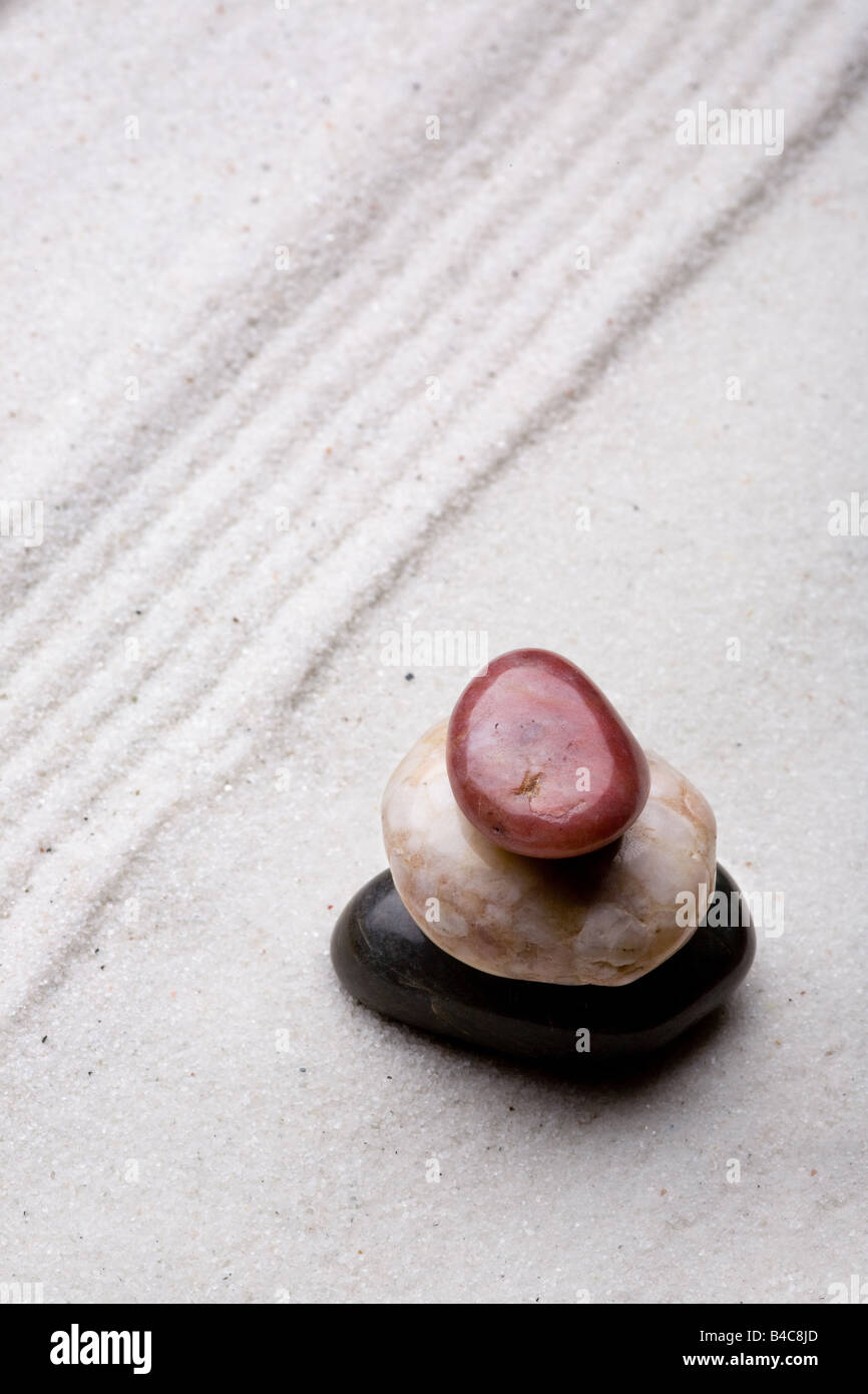 tower of rocks in a sand zen rock garden Stock Photo - Alamy