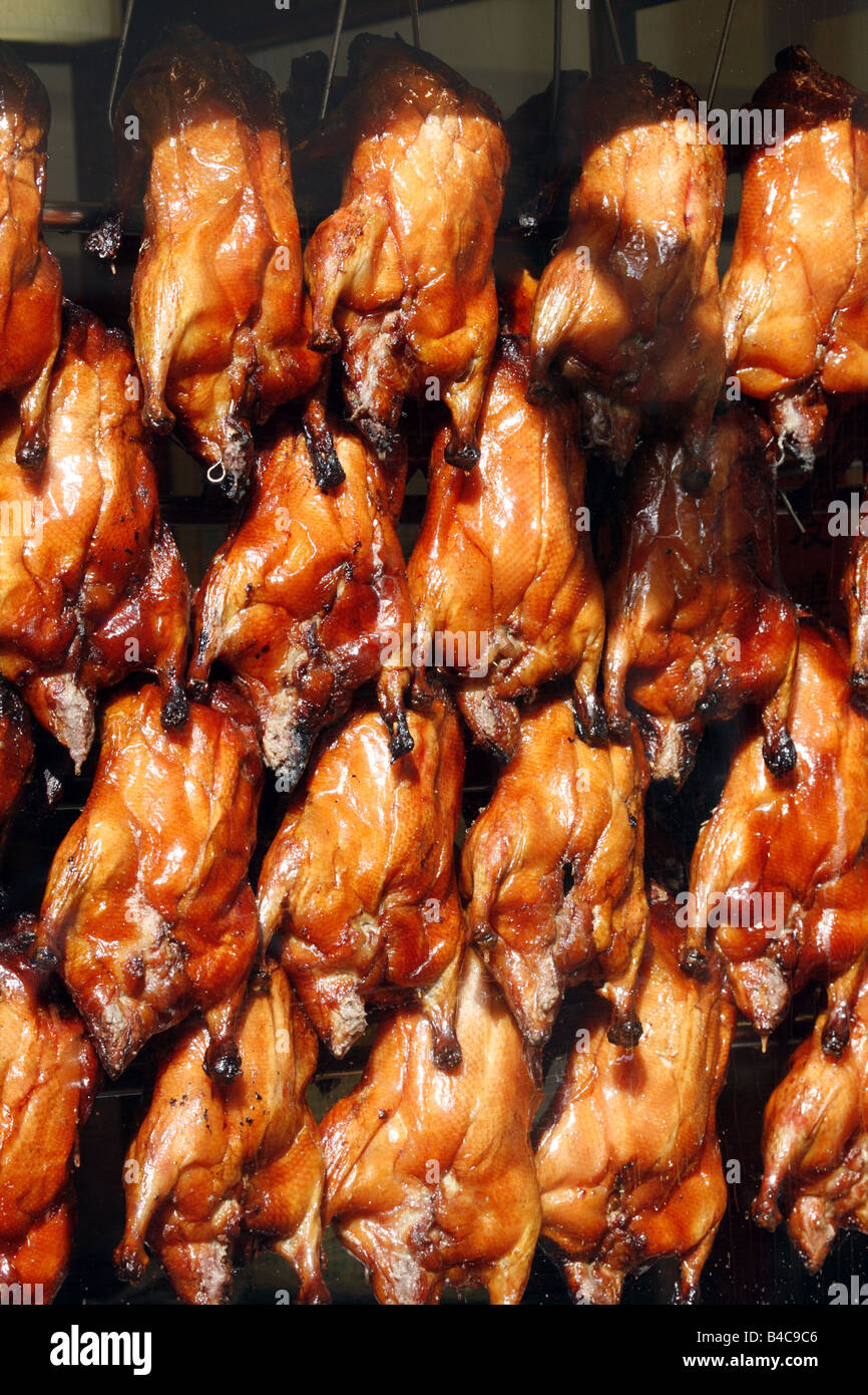 Crispy Fried Ducks hanging in the window of a Chinese restaurant China ...