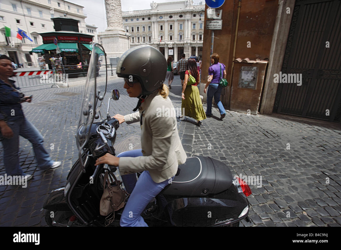 Woman driving a scooter Rome Italy Stock Photo - Alamy