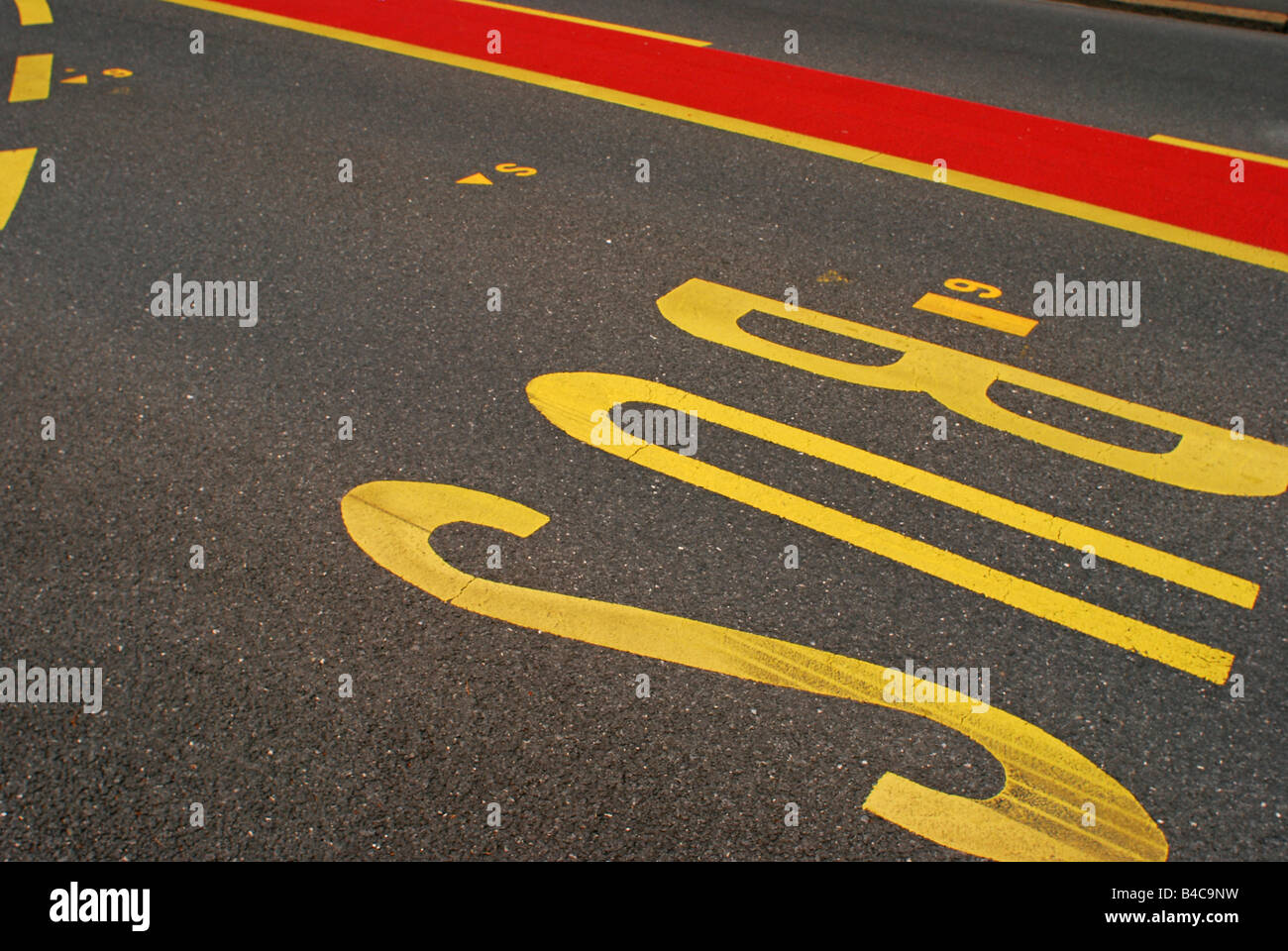 Bus stop marking on road hi-res stock photography and images - Alamy