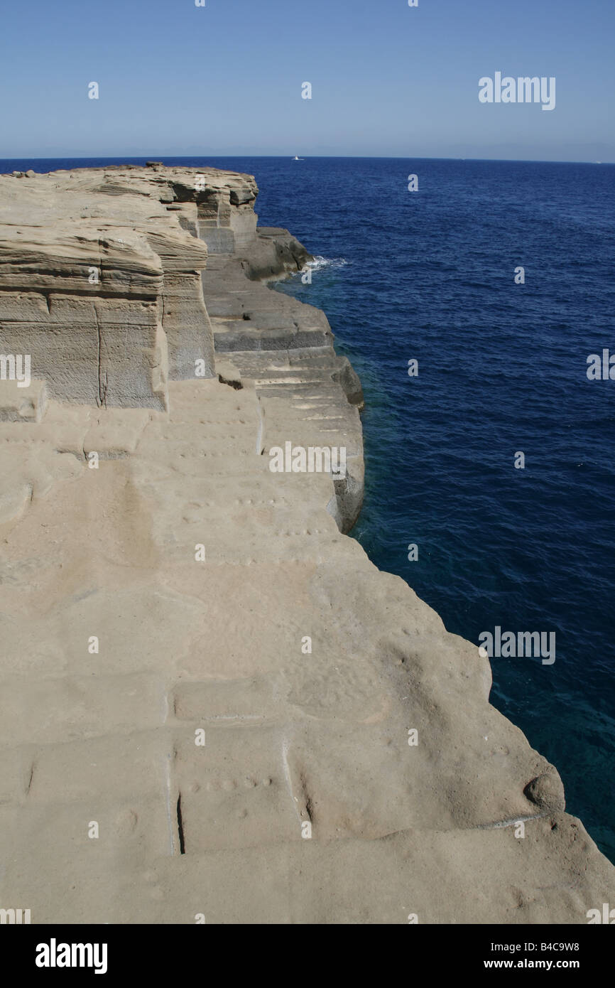 pattern on eroded volcanic rock formation on coast Stock Photo - Alamy