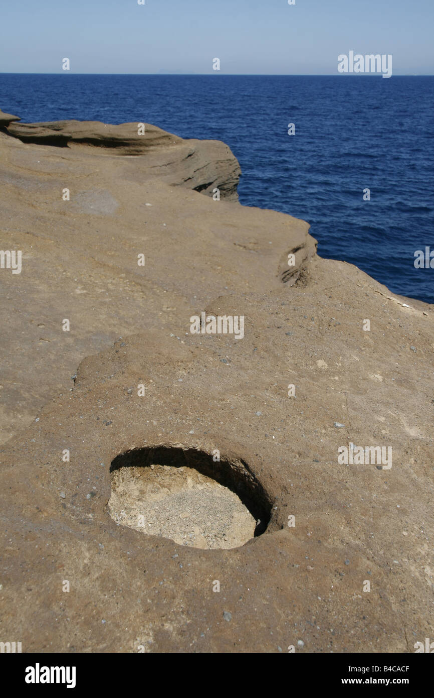 pattern on eroded volcanic rock formation on coast at venotene, italy ...