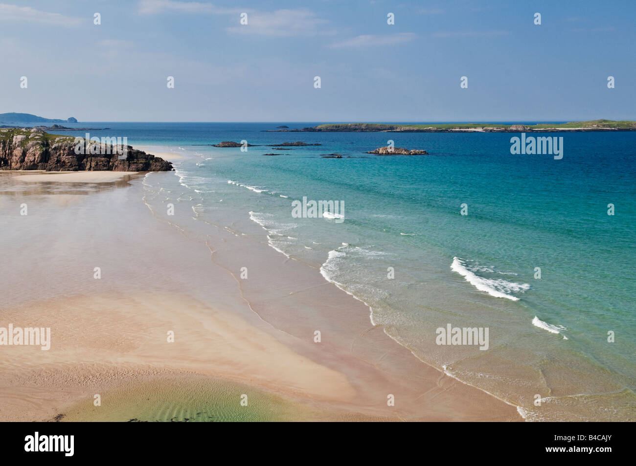 Clear waters of the isolated Traigh Allt Chailgeag beach near Durness ...