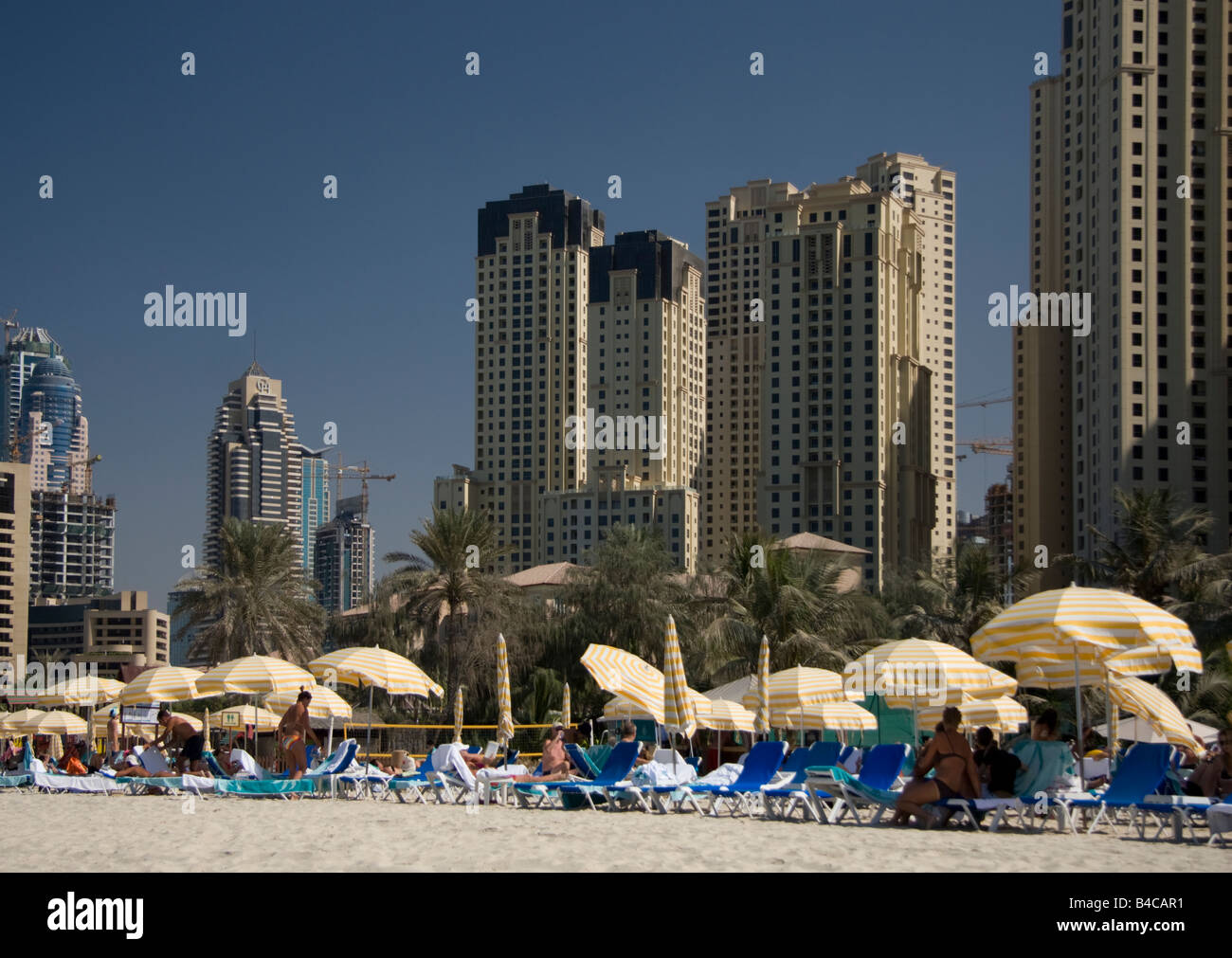 Buildings on the beach in Dubai Stock Photo - Alamy