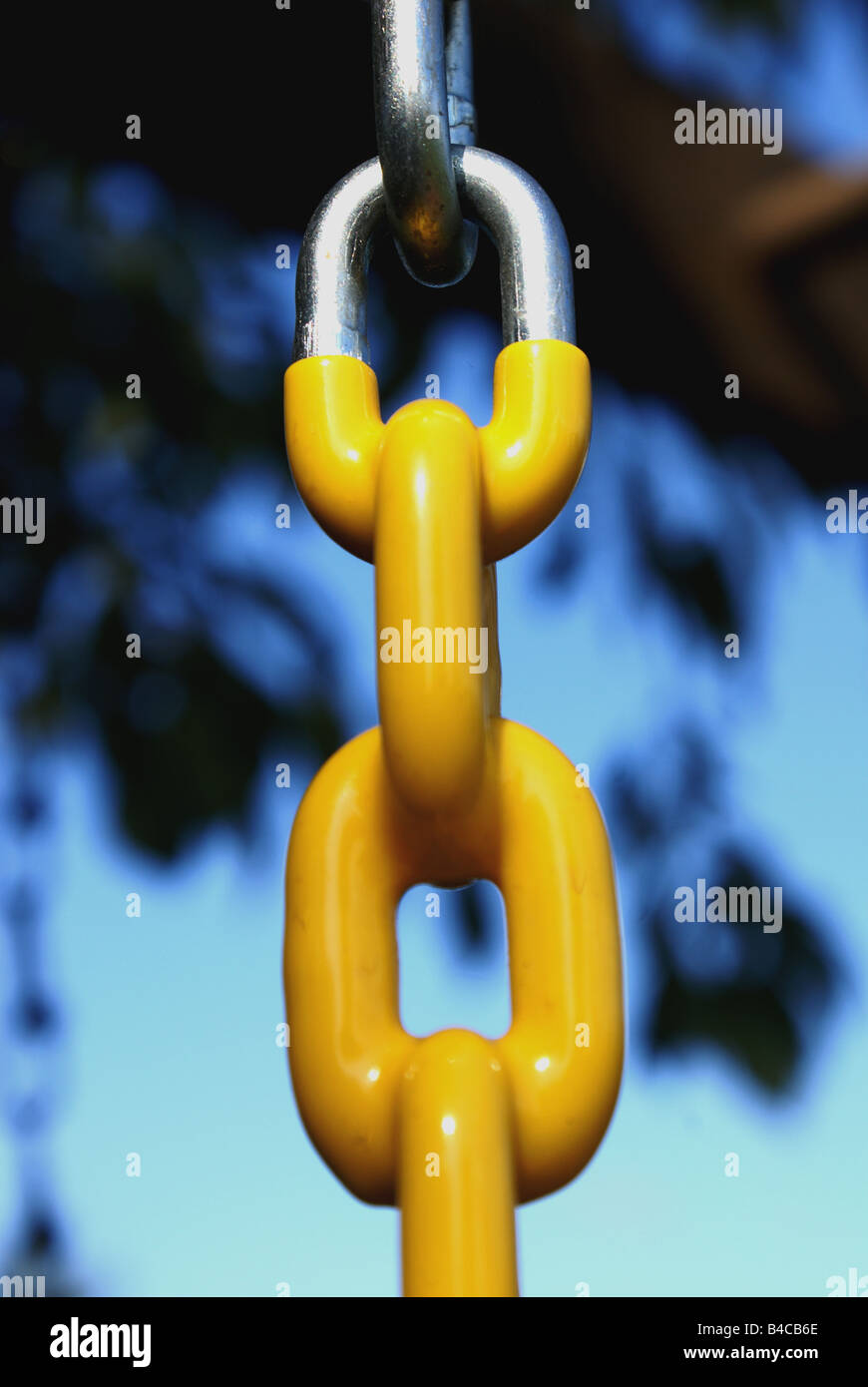 unique design with metal and yellow chain link Stock Photo - Alamy