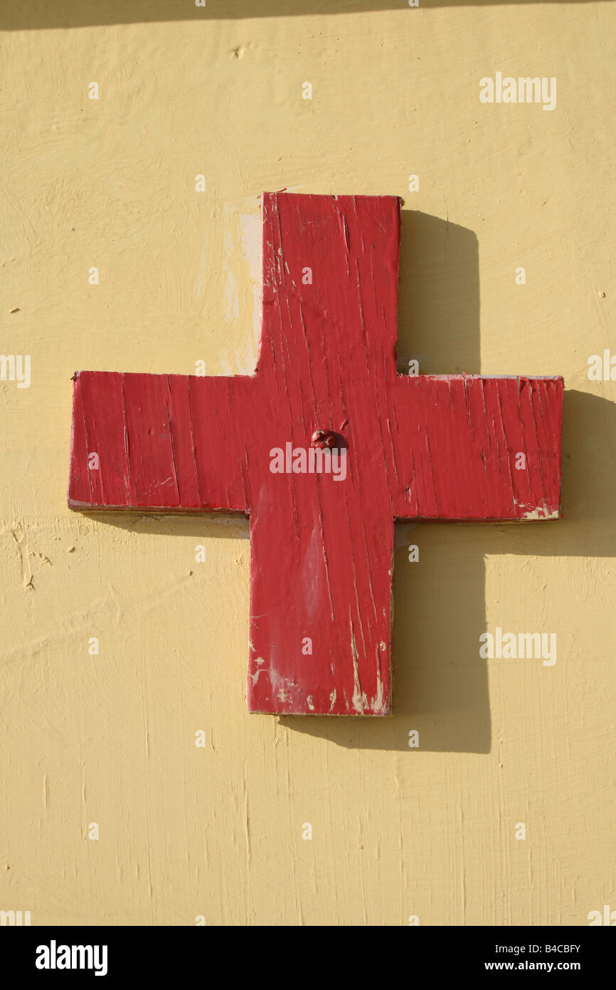 medical help red cross sign on wall Stock Photo - Alamy