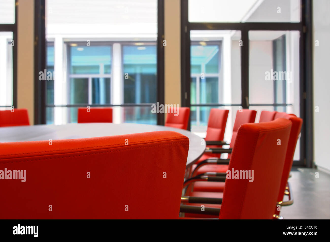 Conference room with red chairs Stock Photo - Alamy