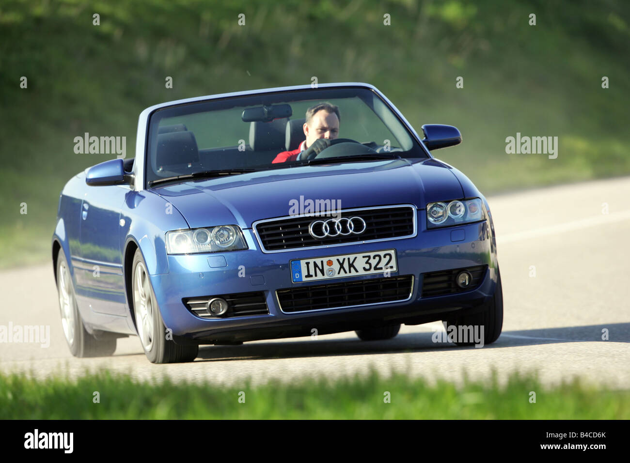 Car, Audi A4 2.0 Convertible, model year 2005-, blue, open top, driving ...