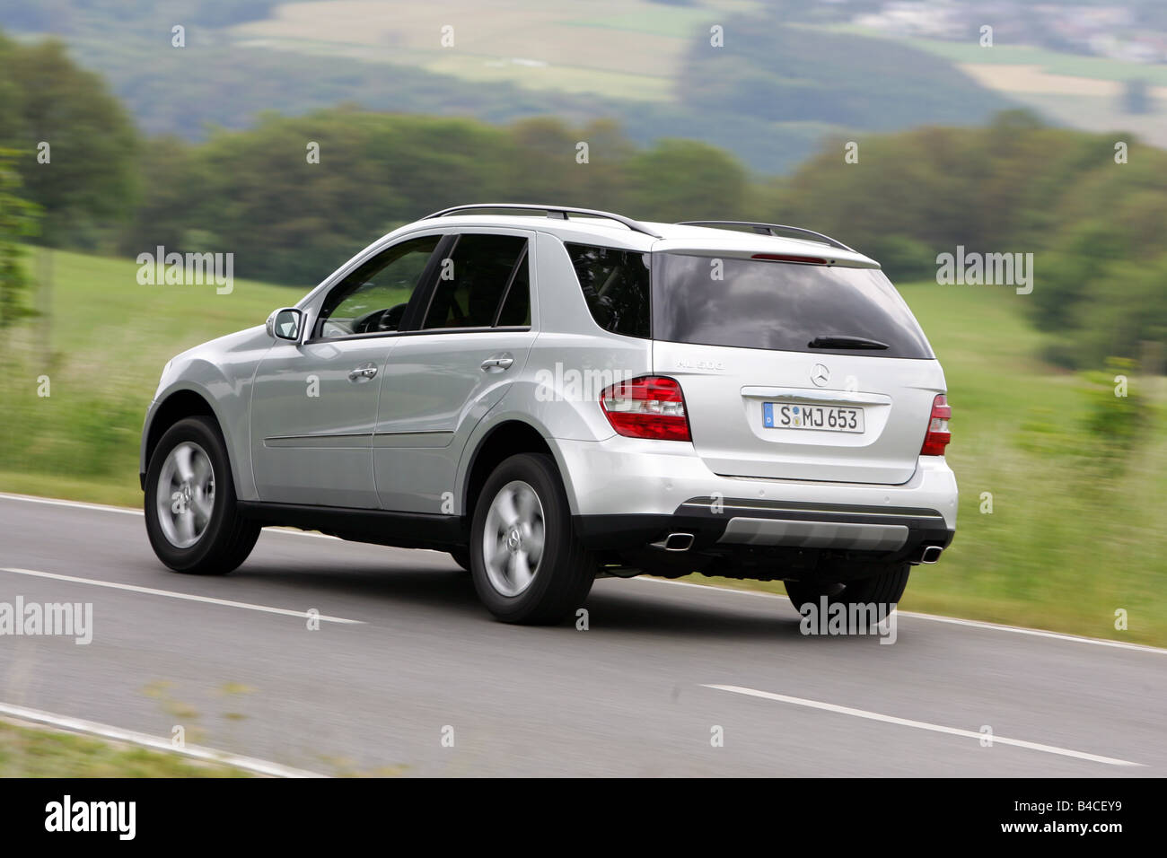 Car, Mercedes ML 500, silver, model year 2005-, driving, diagonal from ...