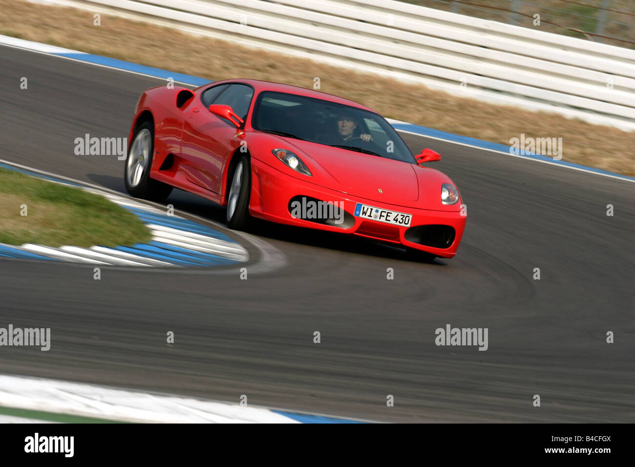 Ferrari F 430, model year 2005-, red, driving, diagonal from the front ...