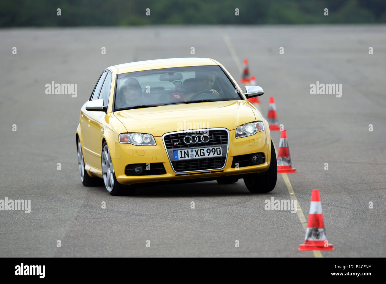 Audi S4, model year 2005-, yellow, driving, diagonal from the front ...