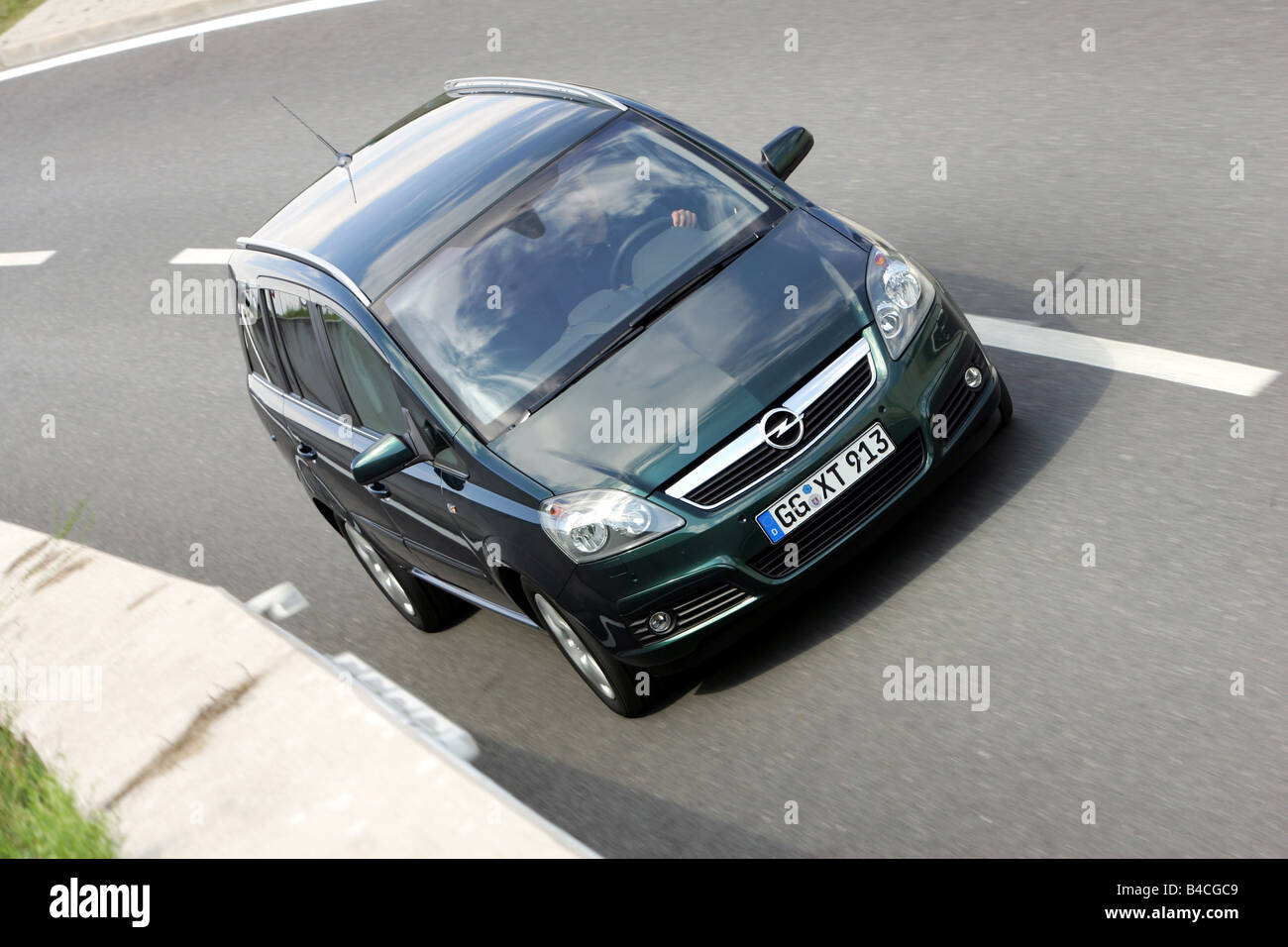 Car, Opel Zafira 1.9 CDTi, Van, model year 2005-, dark green, driving ...