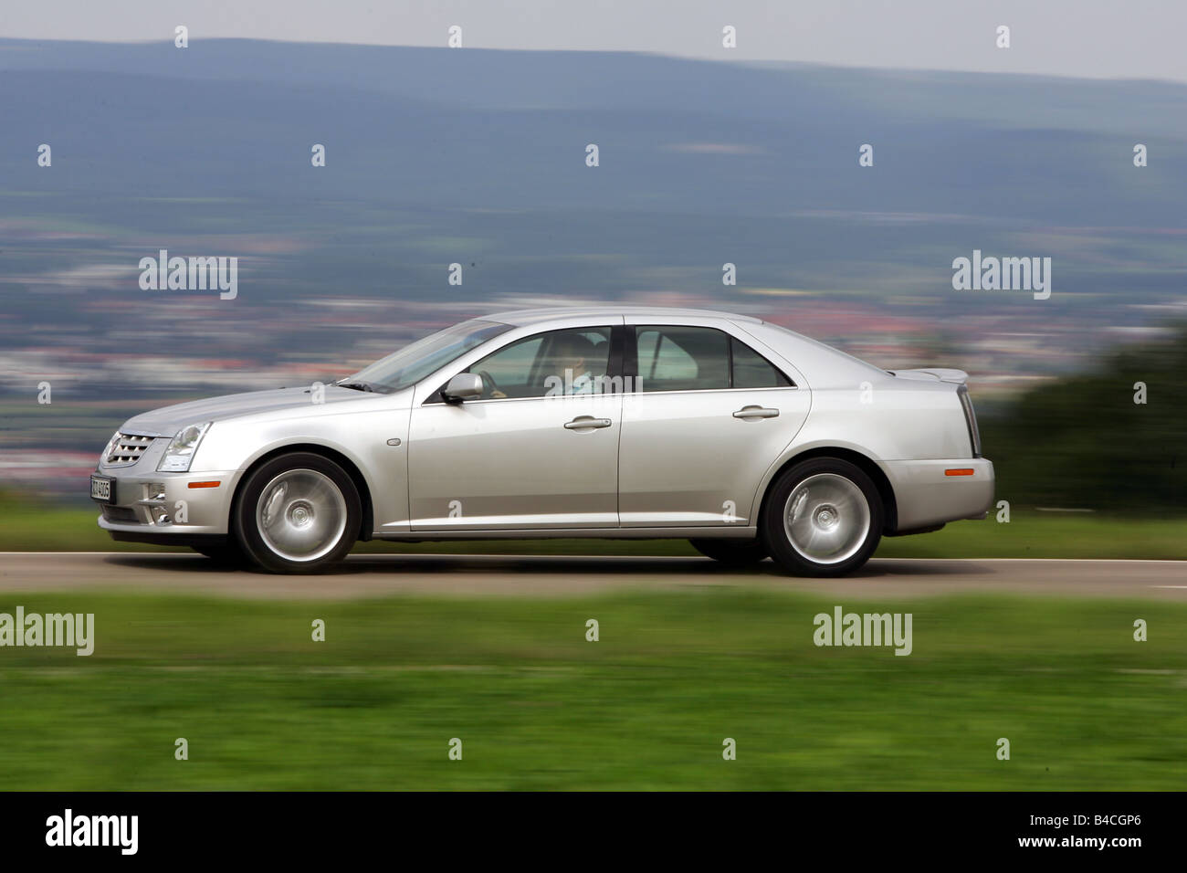 Cadillac STS 4.6 V8, model year 2005-, silver, driving, side view ...