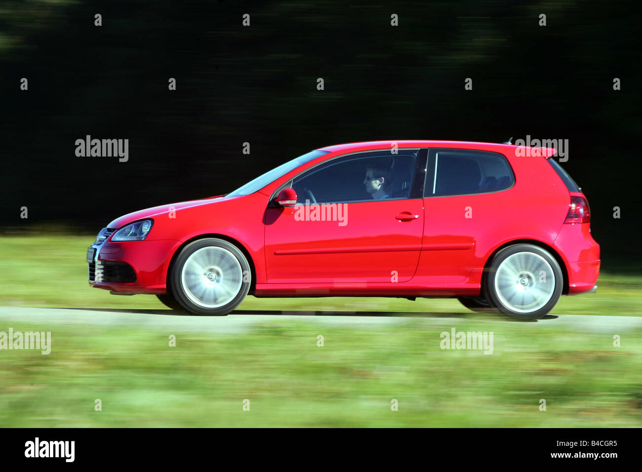 VW Volkswagen Golf R32, model year 2005-, red, driving, side view ...