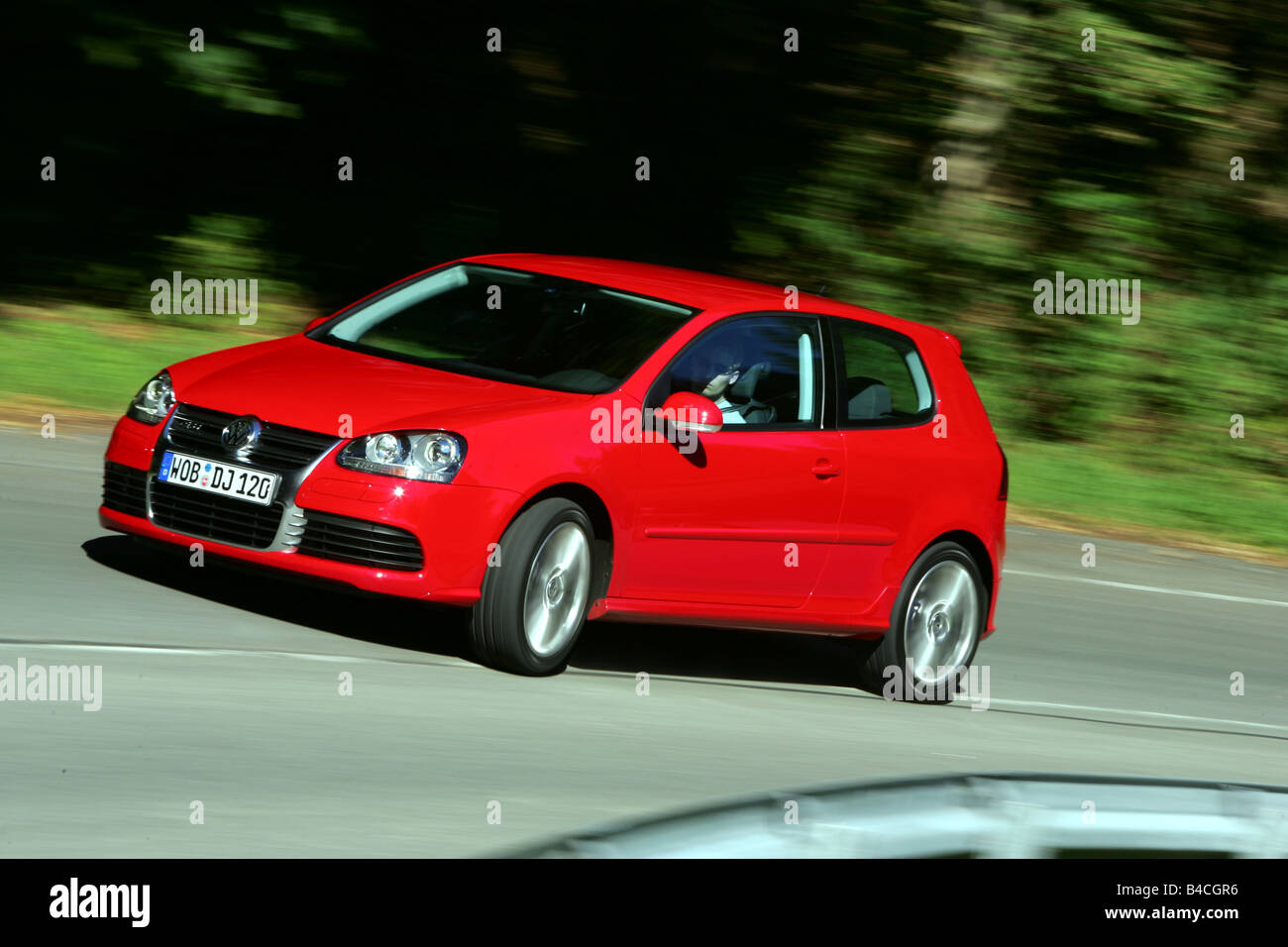 VW Volkswagen Golf R32, model year 2005-, red, driving, diagonal from ...