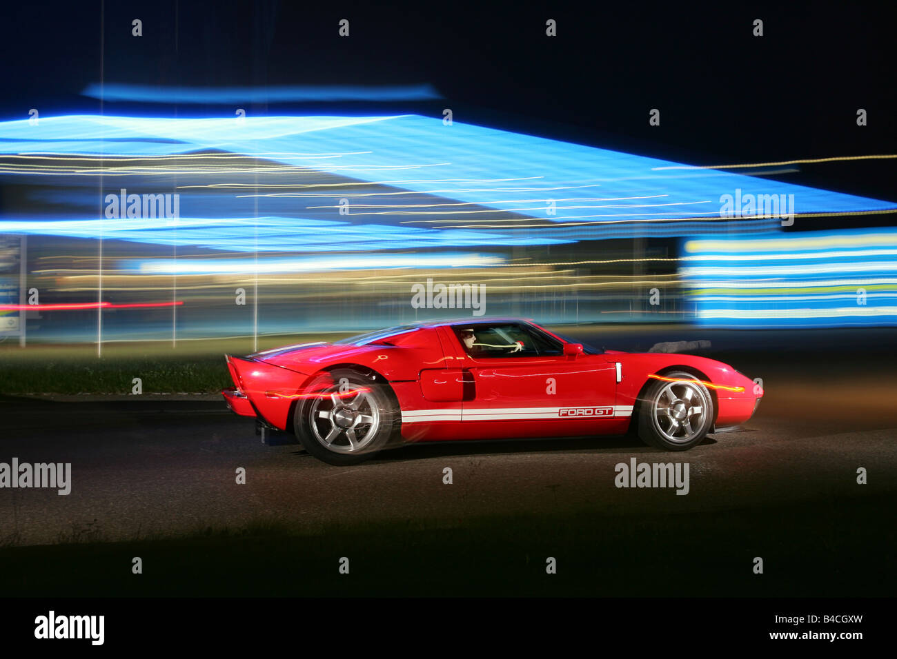 Ford GT, model year 2005-, white-red, driving, side view, landsapprox.e ...