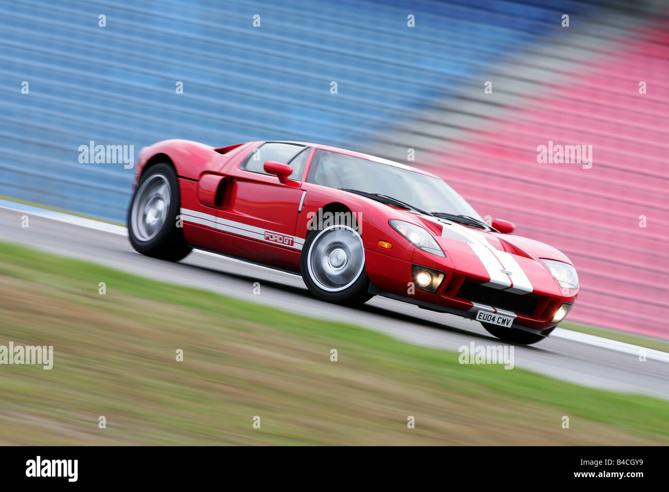 Ford GT, model year 2005-, white-red, driving, diagonal from the front ...