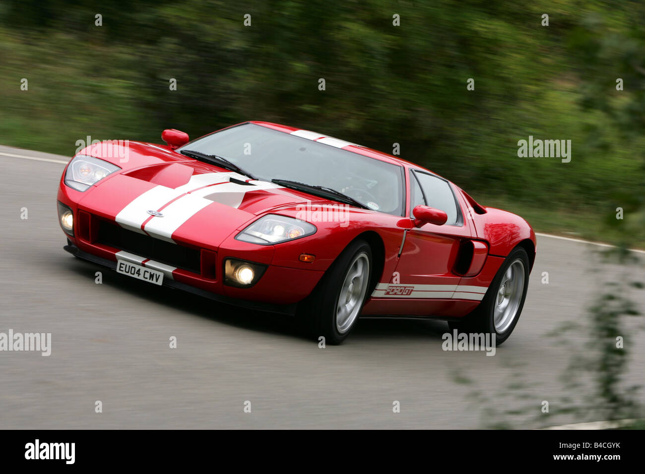 Ford GT, model year 2005-, white-red, driving, diagonal from the front ...