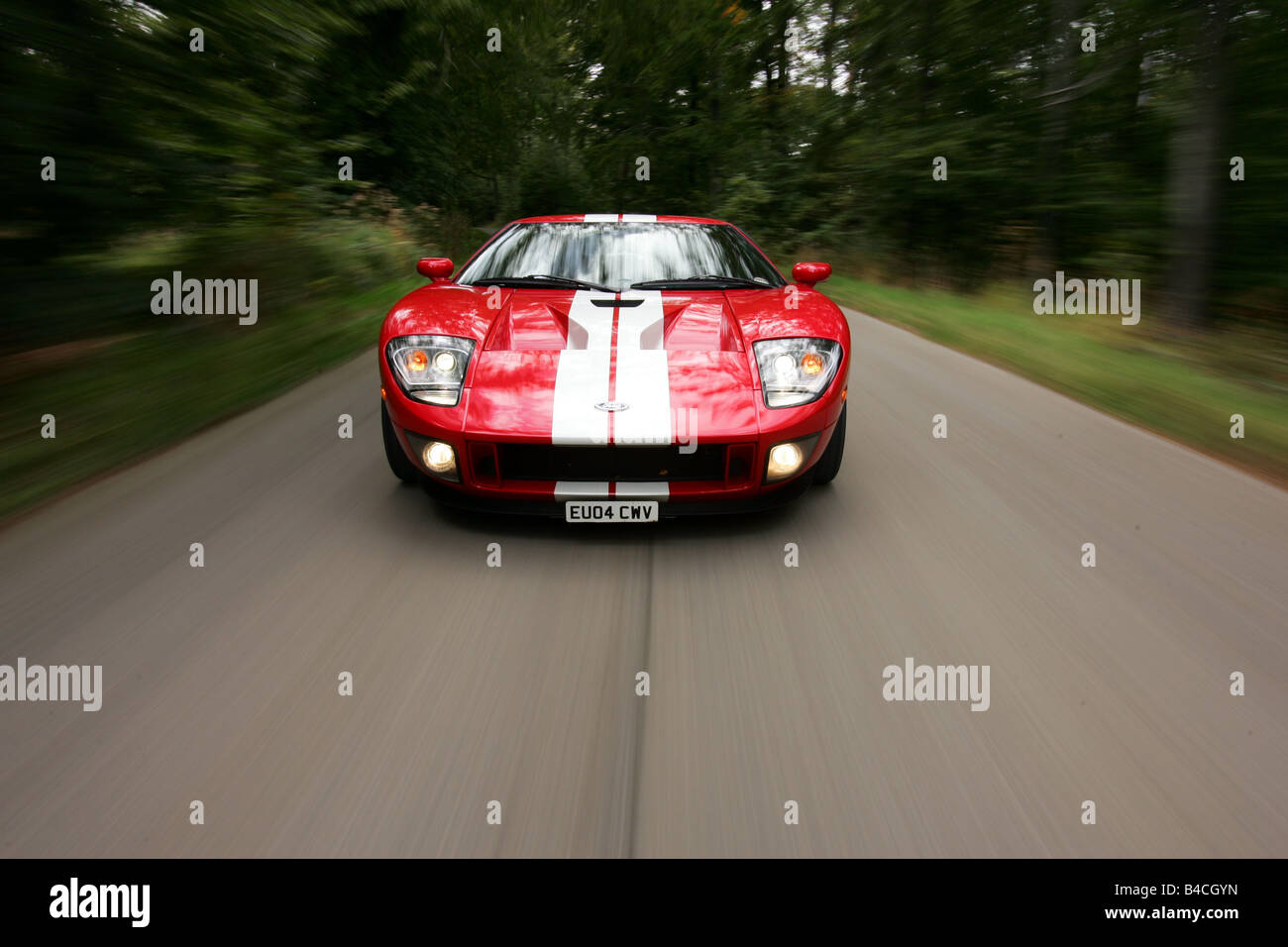 Ford GT, model year 2005-, white-red, driving, diagonal from the front ...