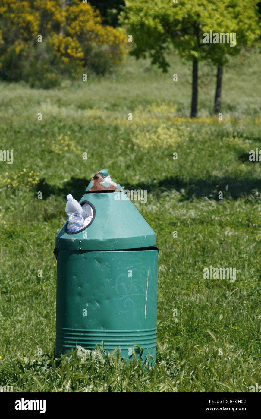 one full green litter bin in countryside Stock Photo - Alamy
