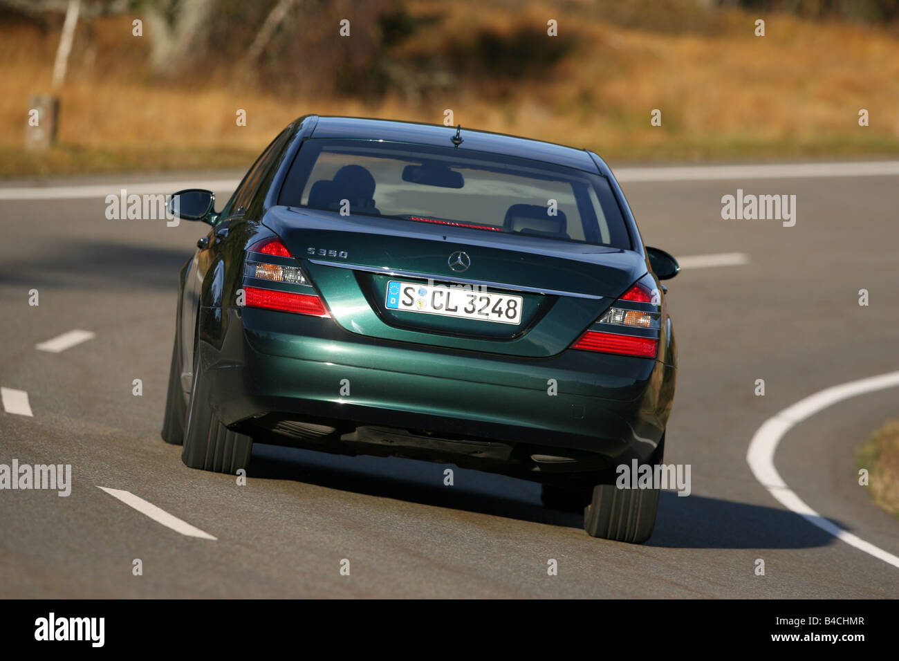 Mercedes S 350, model year 2005-, dark green-metallic, driving ...