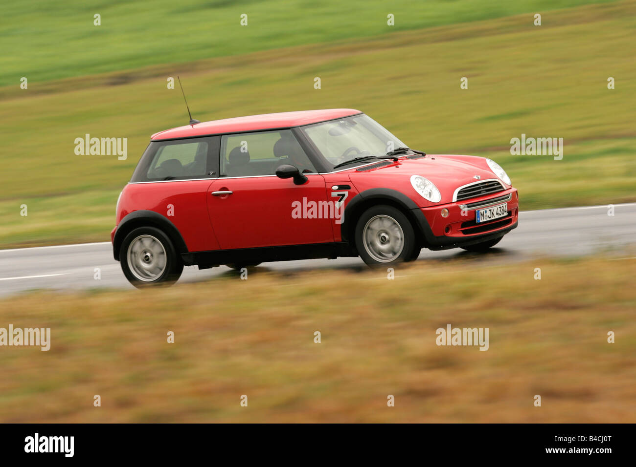 BMW Mini One Seven, model year 2001, red, driving, diagonal from the ...