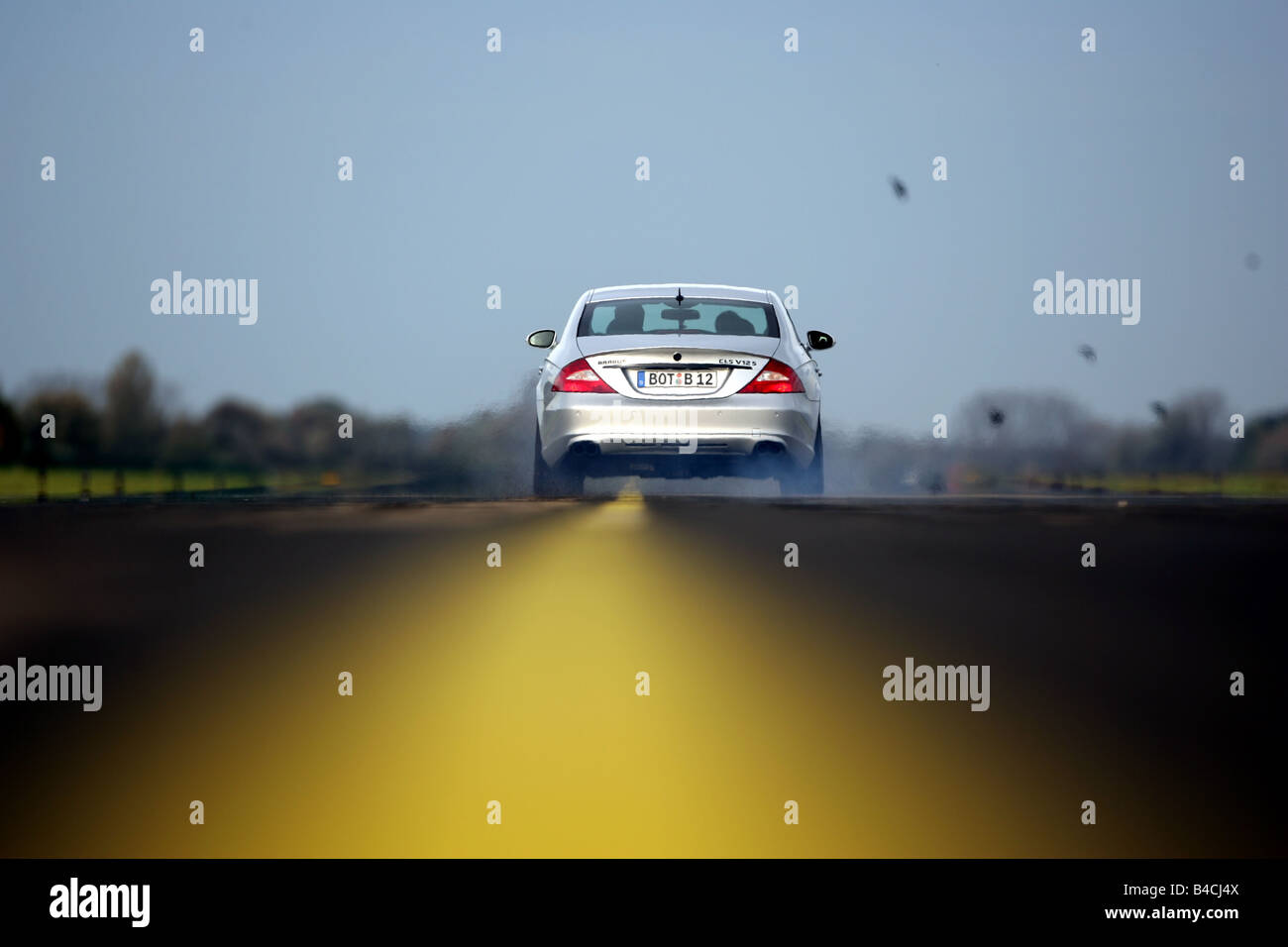 Brabus CLS V12 S Rocket, silver, model year 2005-, driving, rear view ...