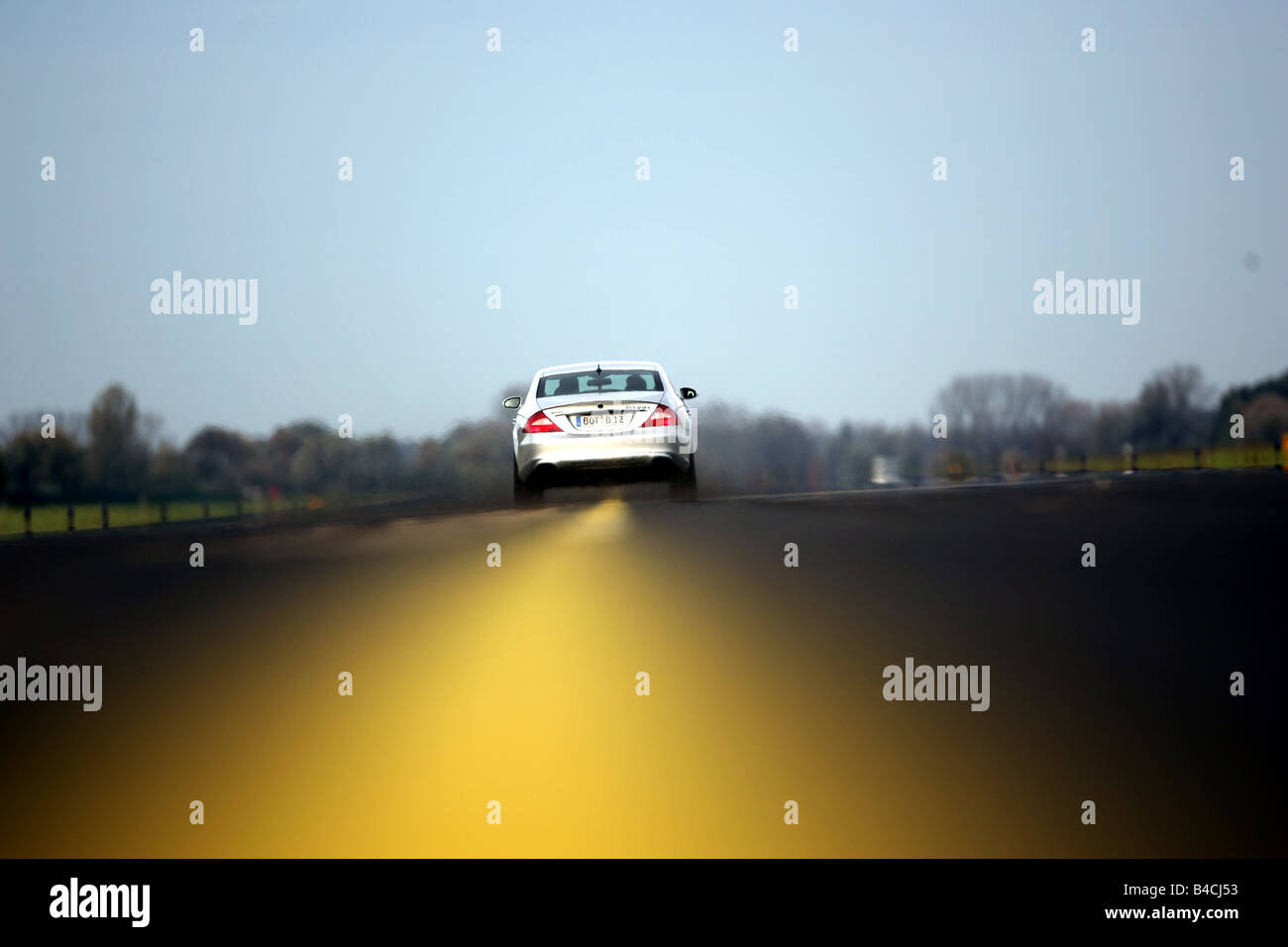 Brabus CLS V12 S Rocket, silver, model year 2005-, driving, rear view ...