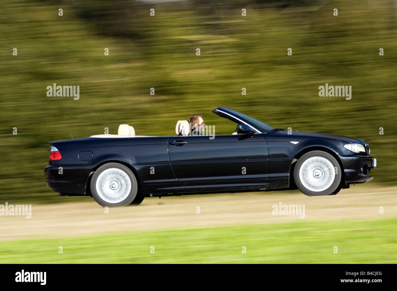 BMW 330 Cd Convertible, model year 2005-, black, driving, side view ...