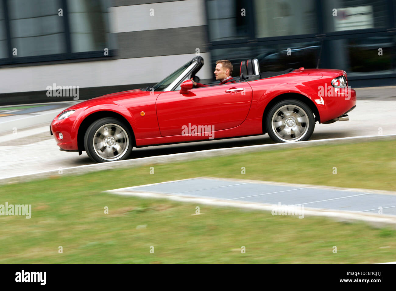 Mazda MX-5, model year 2005-, red, driving, side view, City, open top ...