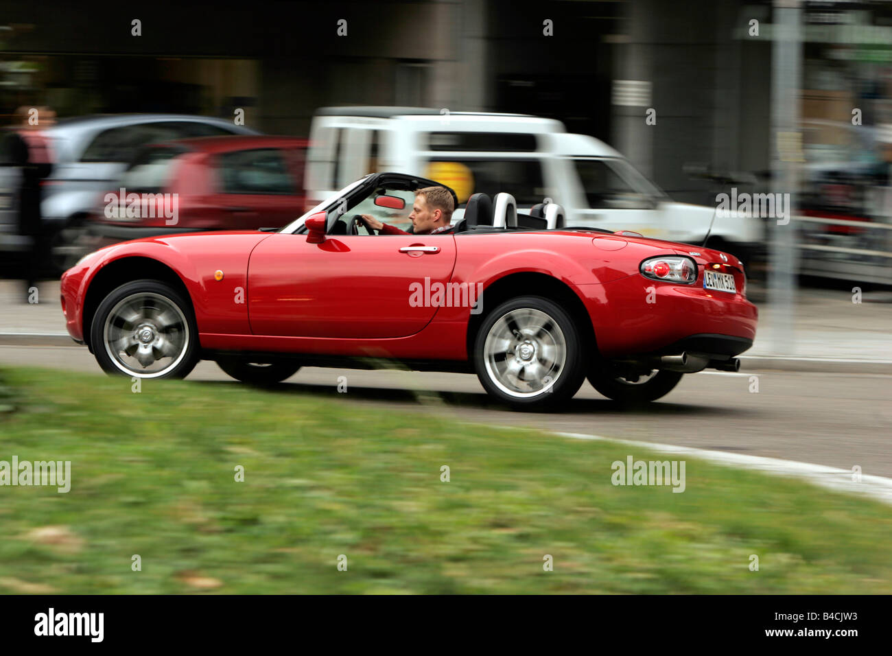 Mazda MX-5, model year 2005-, red, driving, side view, City, open top ...