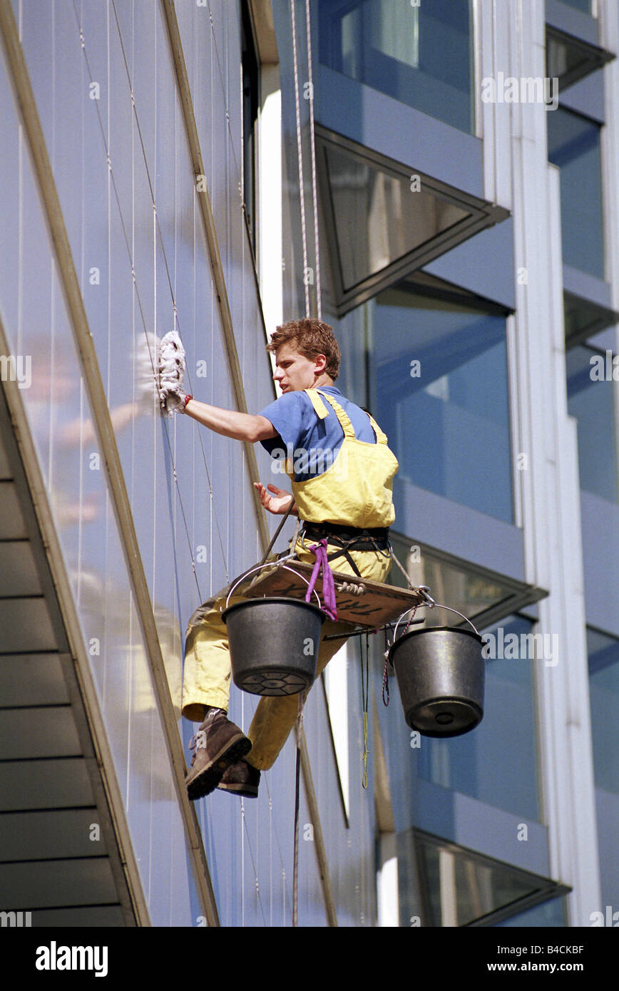 A window cleaner at work Stock Photo - Alamy