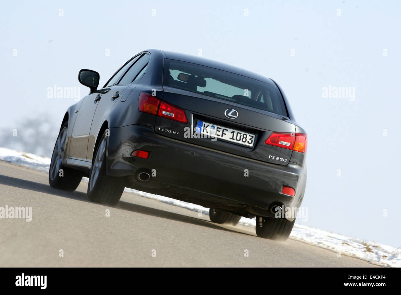 Lexus IS 250, model year 2005-, black, driving, diagonal from the back ...